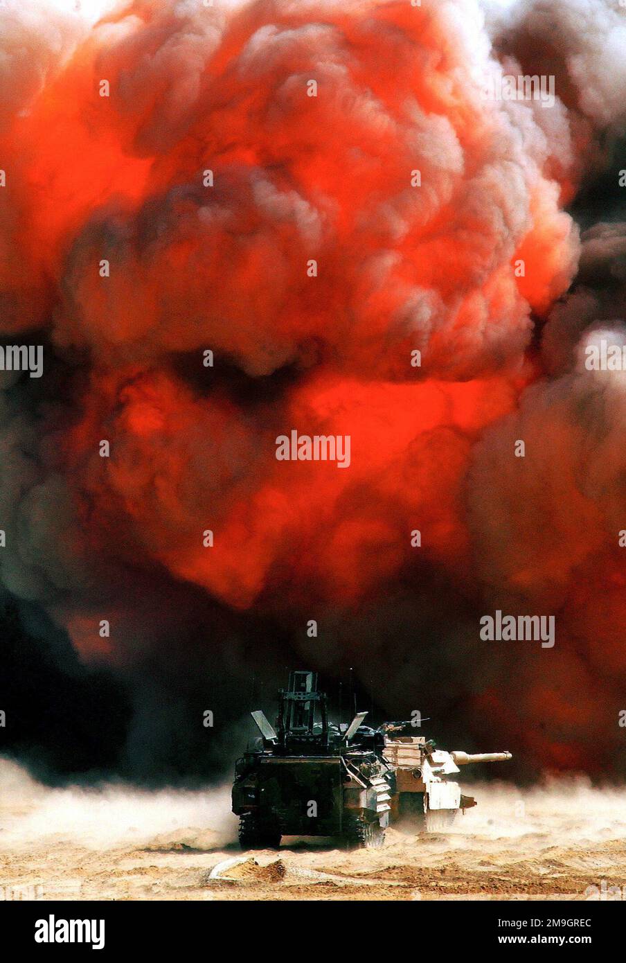 A Marine Corps armored vehicle launches a Mine Clearing Land Charge ...