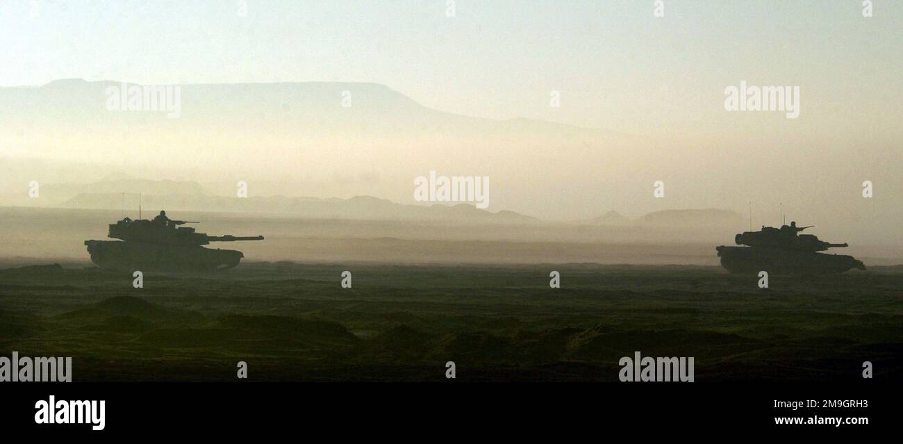 011014-F-0193C-007. [Complete] Scene Caption: In the early hours of the ...