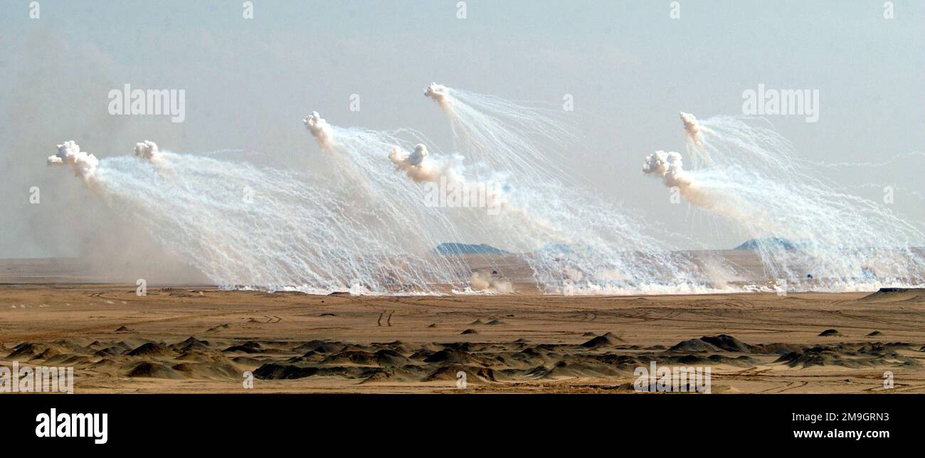 011014-F-7203T-011. [Complete] Scene Caption: Bombs, fired by Marine ...