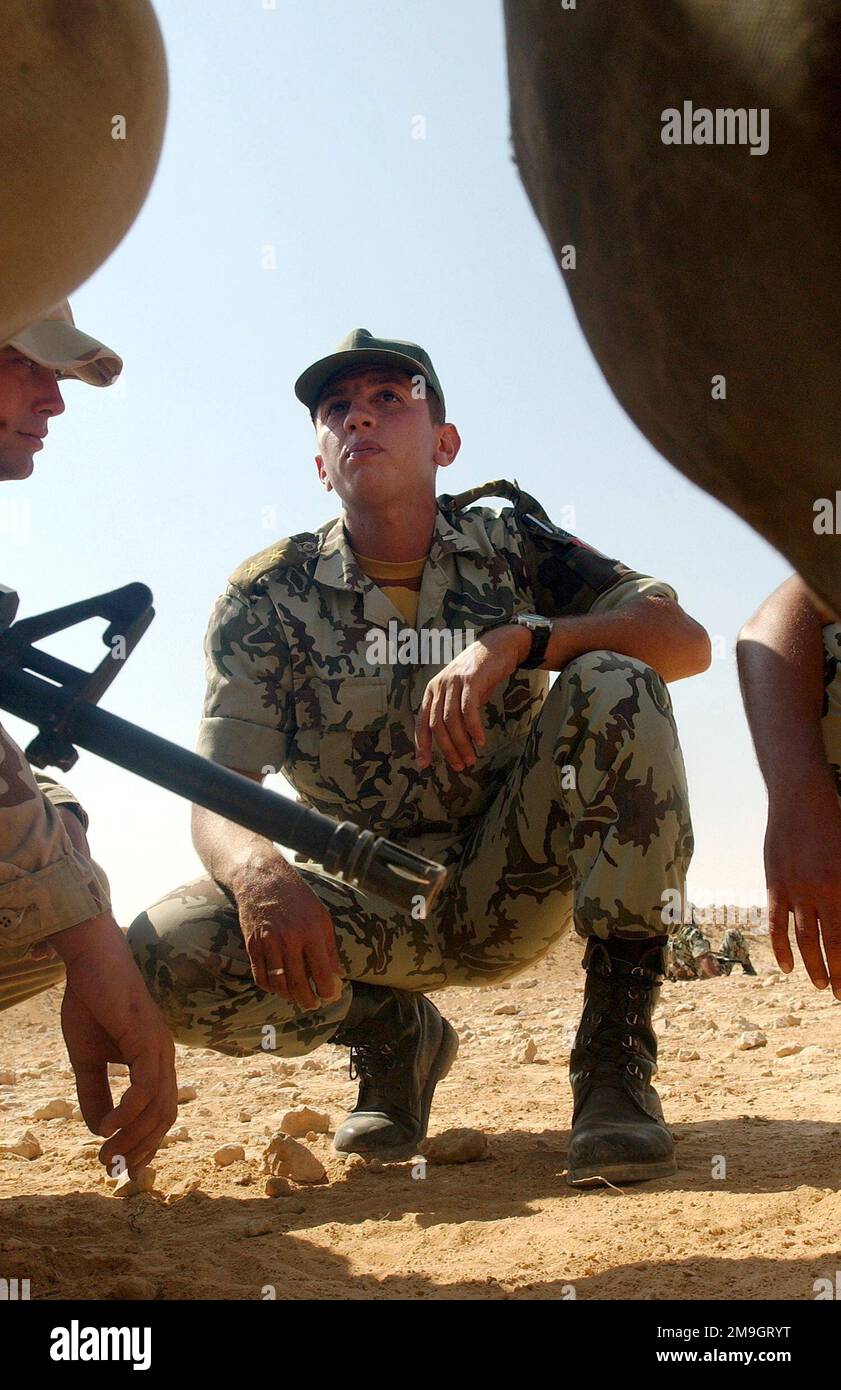 011015-F-0193C-005. [Complete] Scene Caption: First Lieutenant Aladin ...