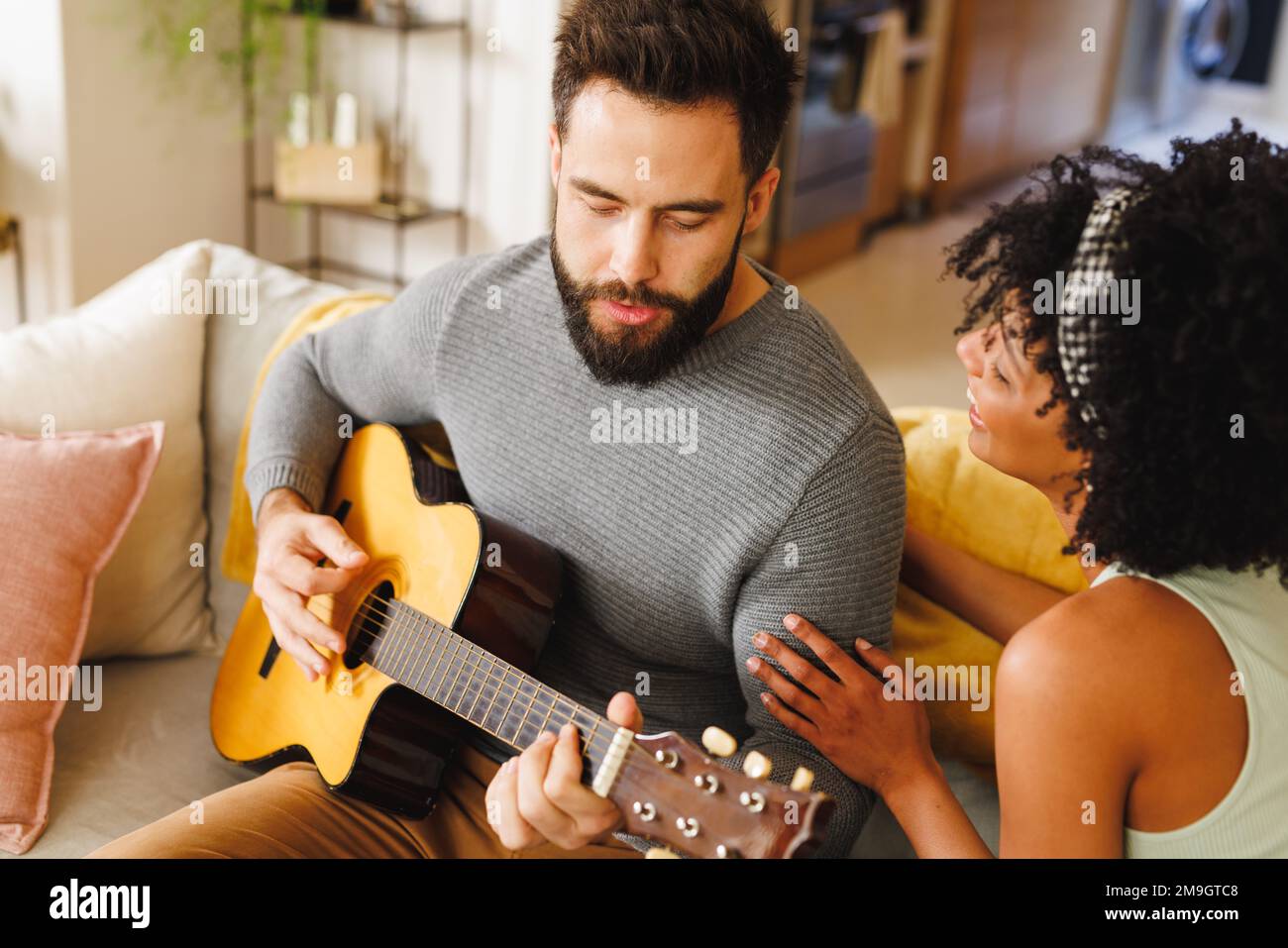 Singing And Playing Guitar