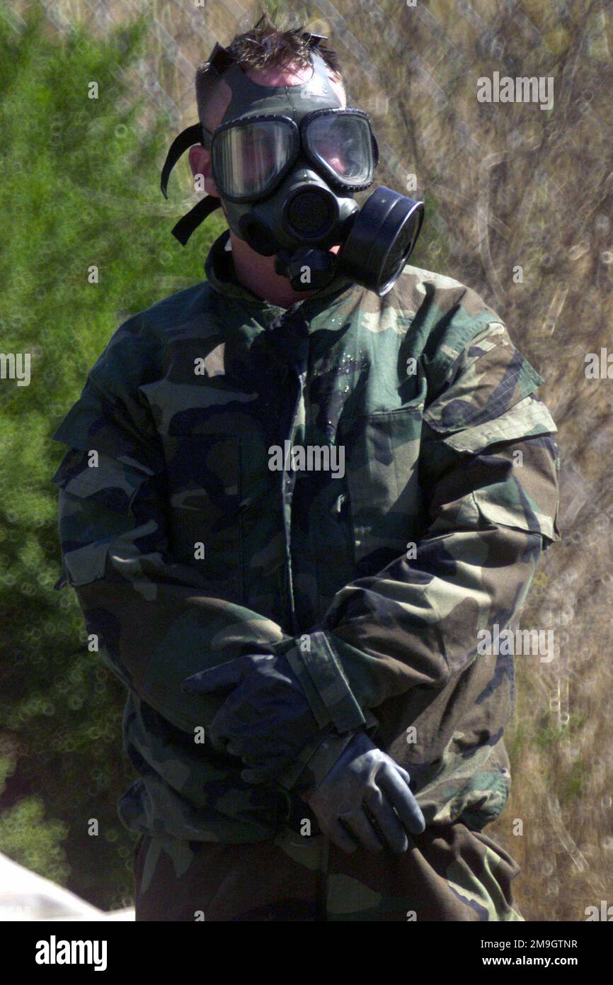 Wearing the M40 Chemical-Biological Field Mask, US Marine Corporal ...