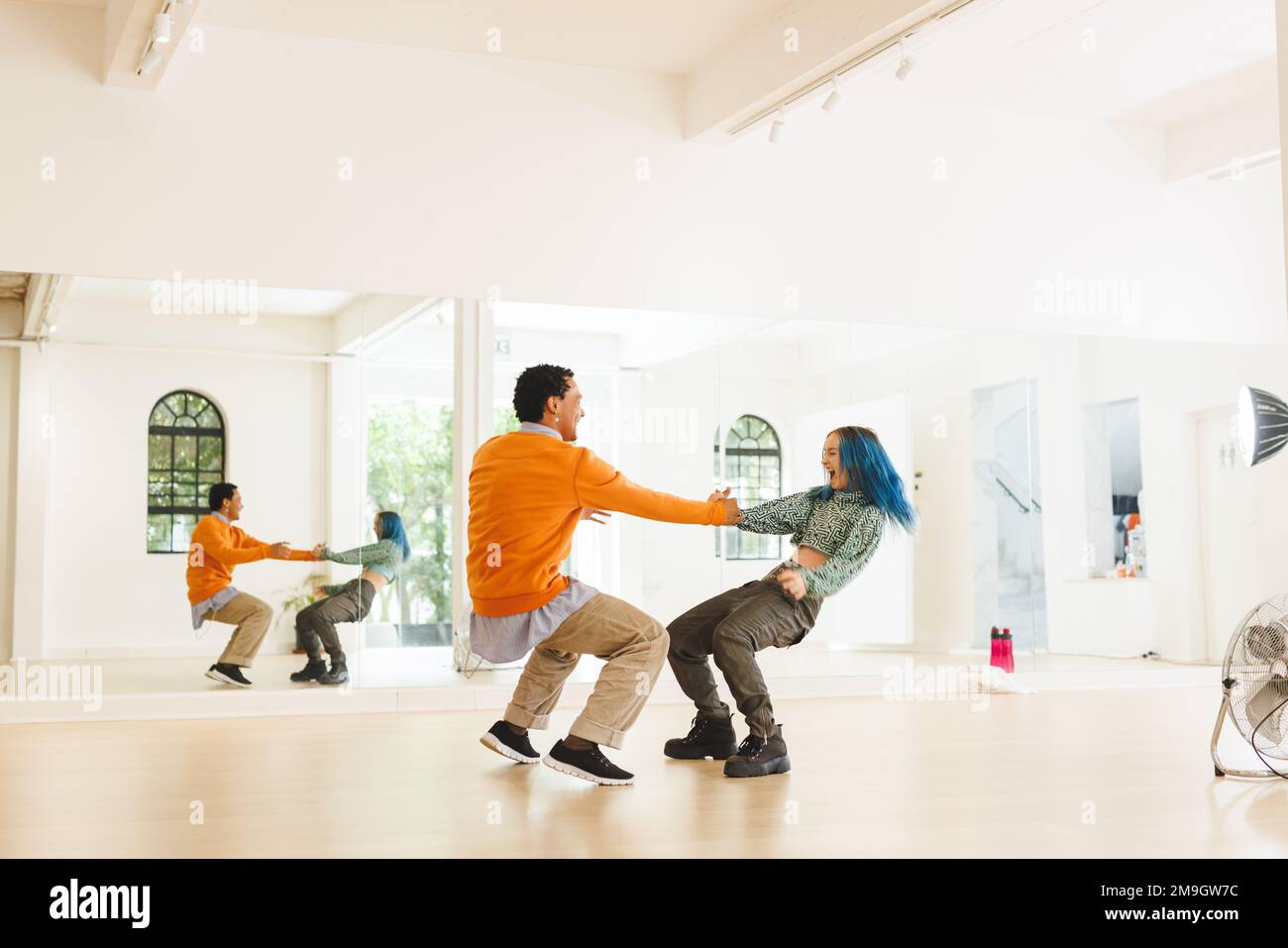 Image of diverse female and male hip hop dancers during training in ...