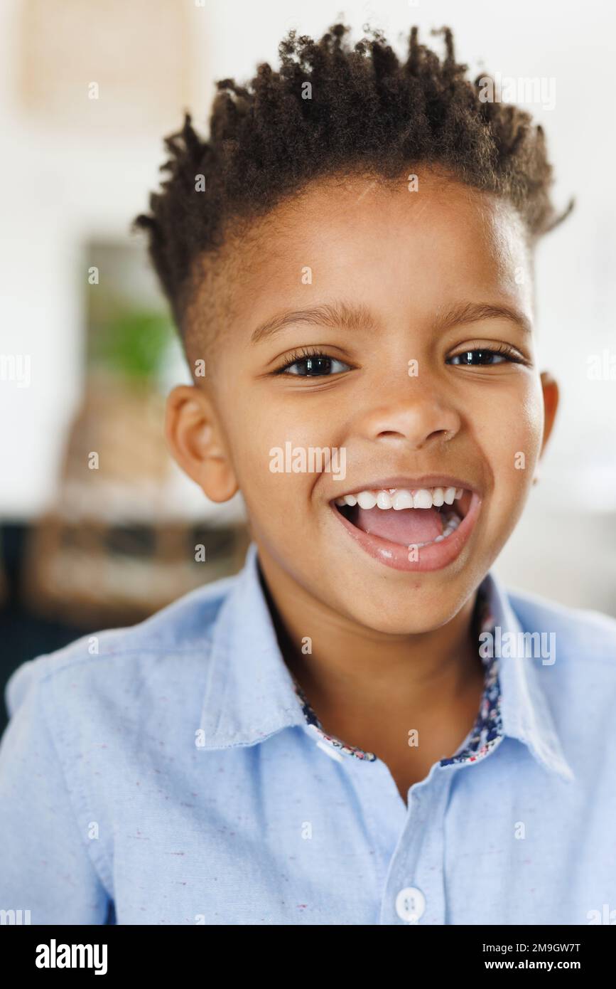 Portrait of happy african american boy looking at camera and smiling ...