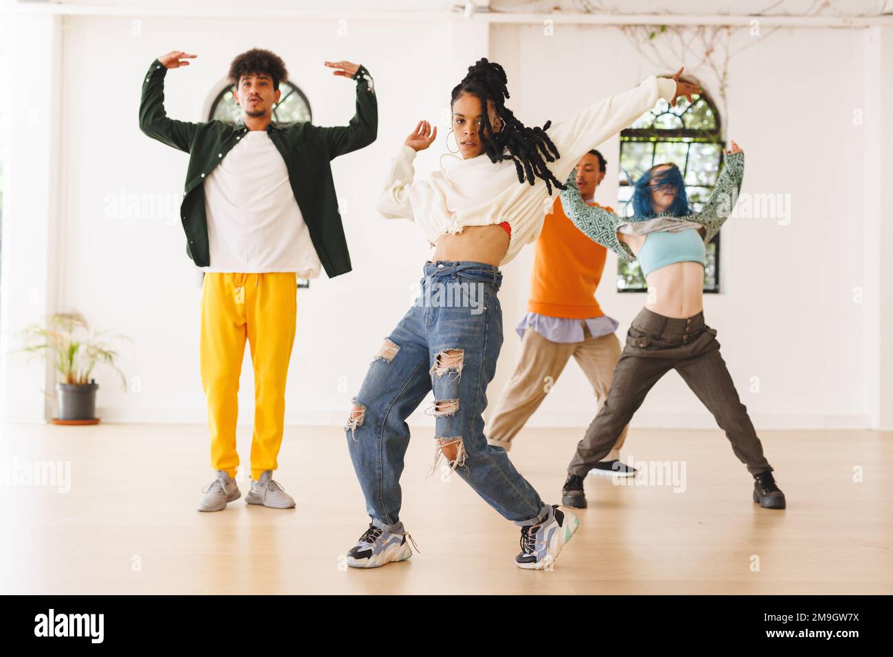 Image of diverse female and male hip hop dancers during training in ...