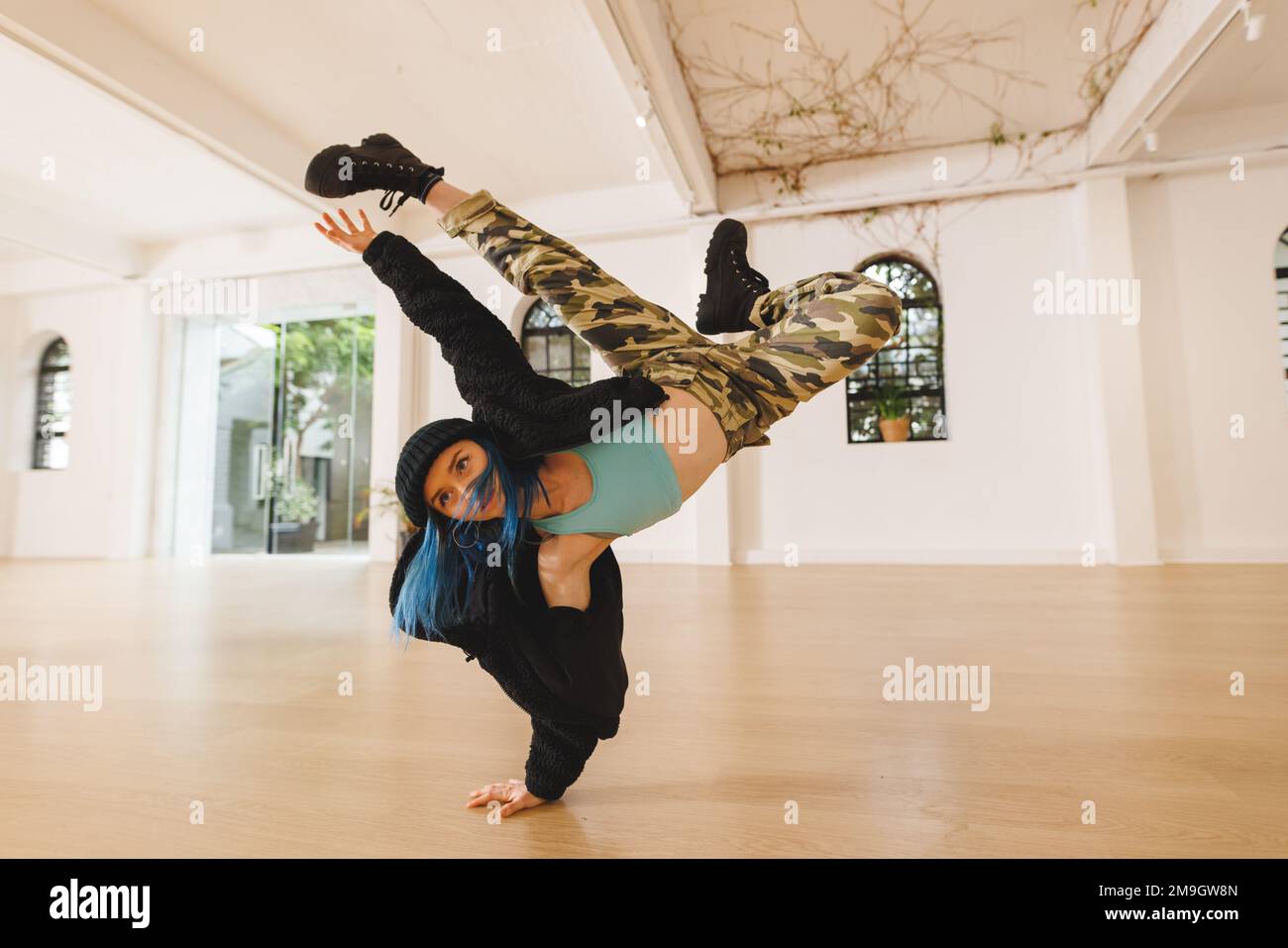 Image of caucasian female hip hop dancer practicing in studio Stock ...