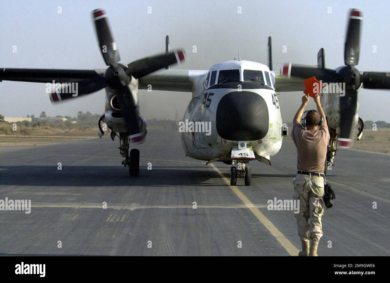 Technical Sergeant (TSGT) Jerry Holik, USAF, a TALCE (Tanker Airlift ...