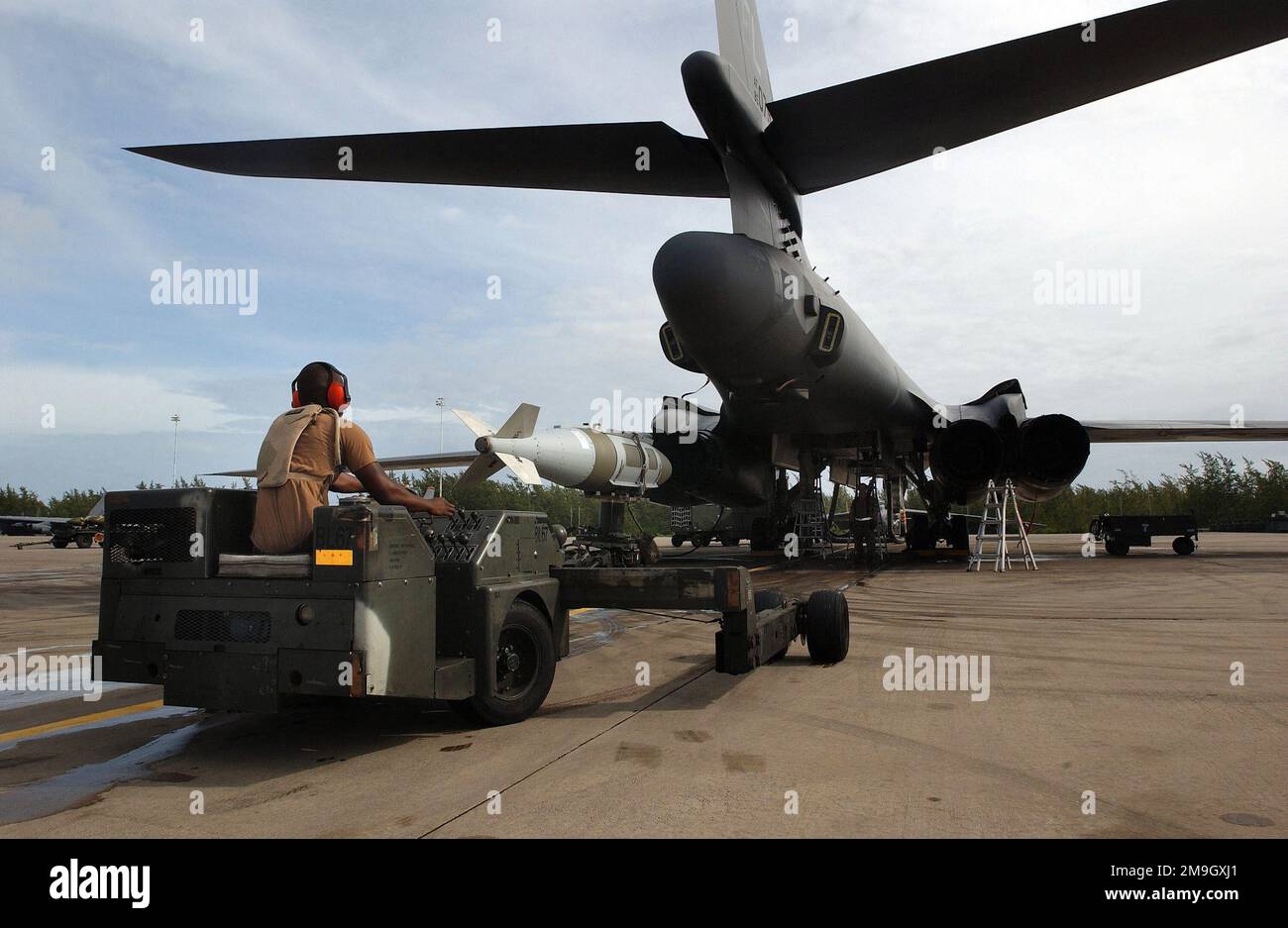 An Air Force weapons loader from the 28th Air Expeditionary Wing ...