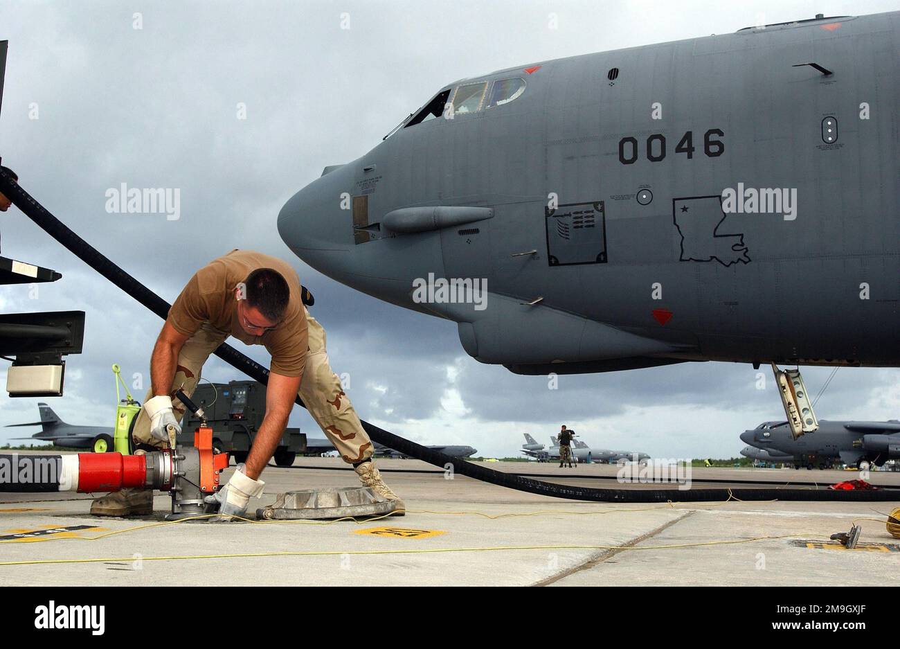From a hot pit refueling point an Air Force fuels journeyman from the ...