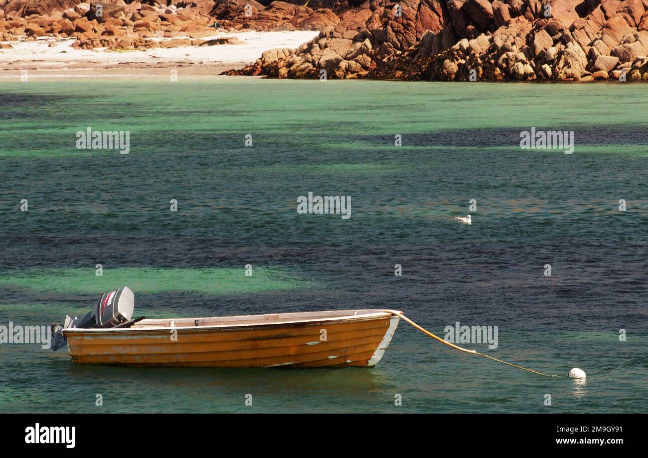 A small craft at anchor in the bay at Fionnphort, Mull, Scotland UK ...