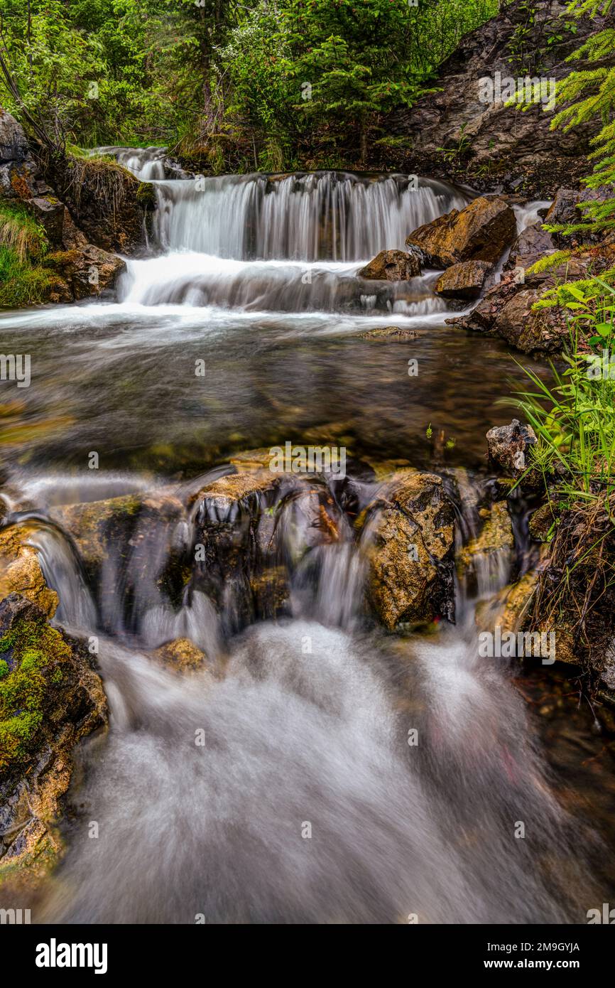 Landscape with waterfall and stream, Hidden Falls, Canmore Creek ...