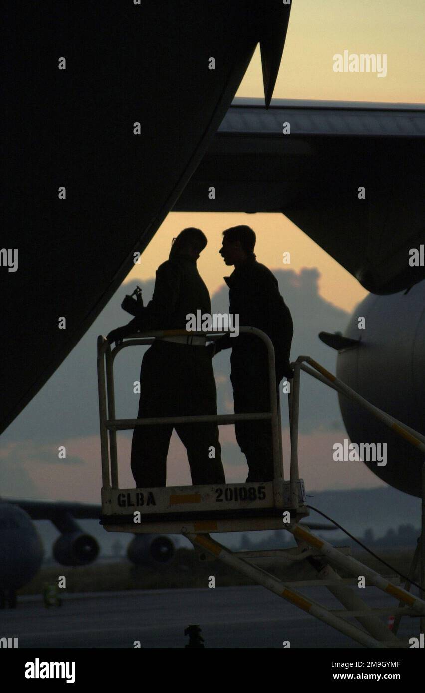 SENIOR AIRMAN Derek Turnipseed, USAF, (left), structural maintenance ...
