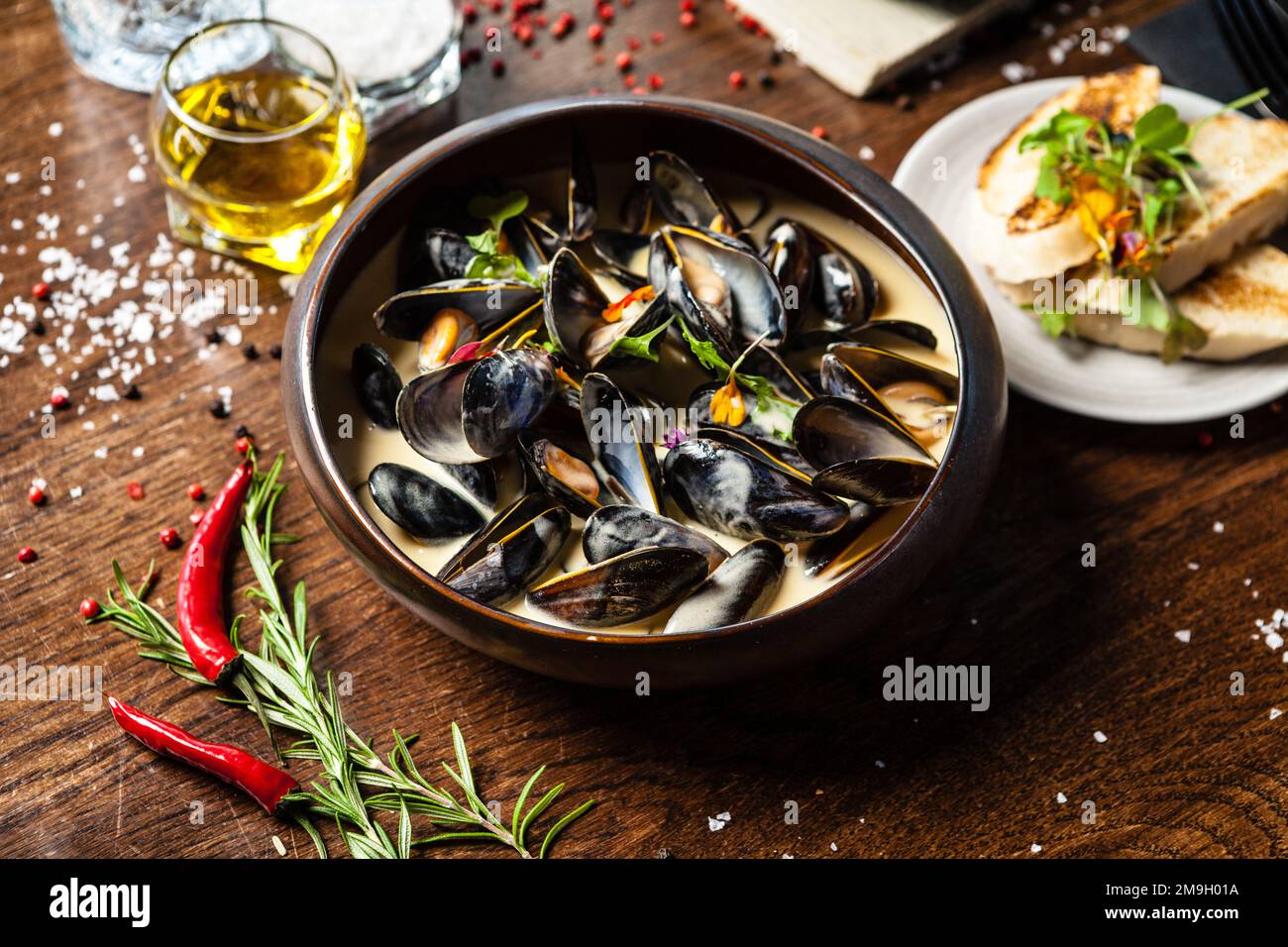 Blue mussels in cream wine sauce. Delicious healthy Italian traditional ...