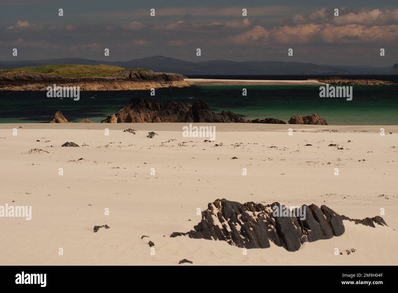 White Strand of the Monk's beach, Iona, Scotland Uk on a sunny summer's ...