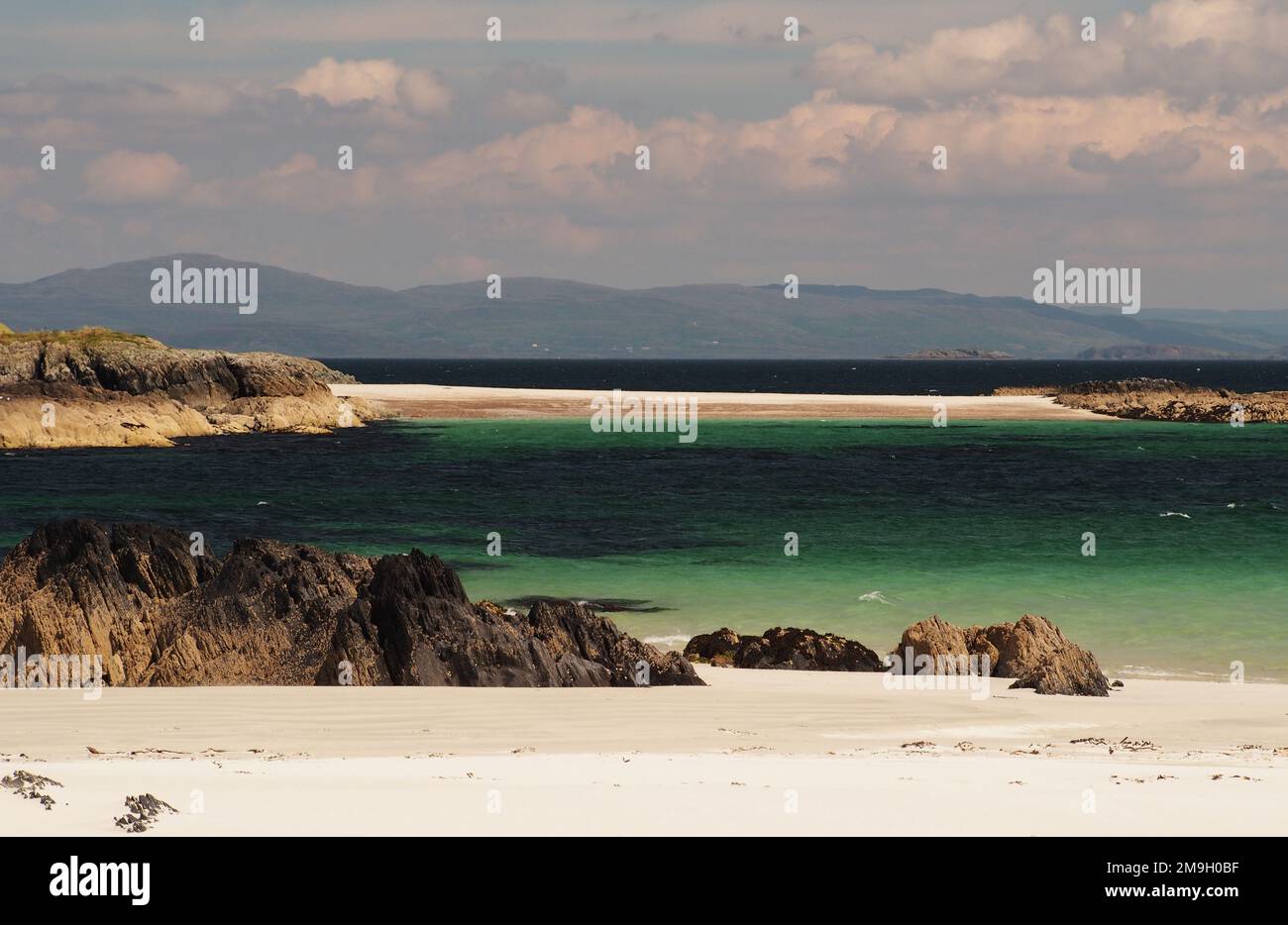 White Strand of the Monk's beach, Iona, Scotland Uk on a sunny summer's ...