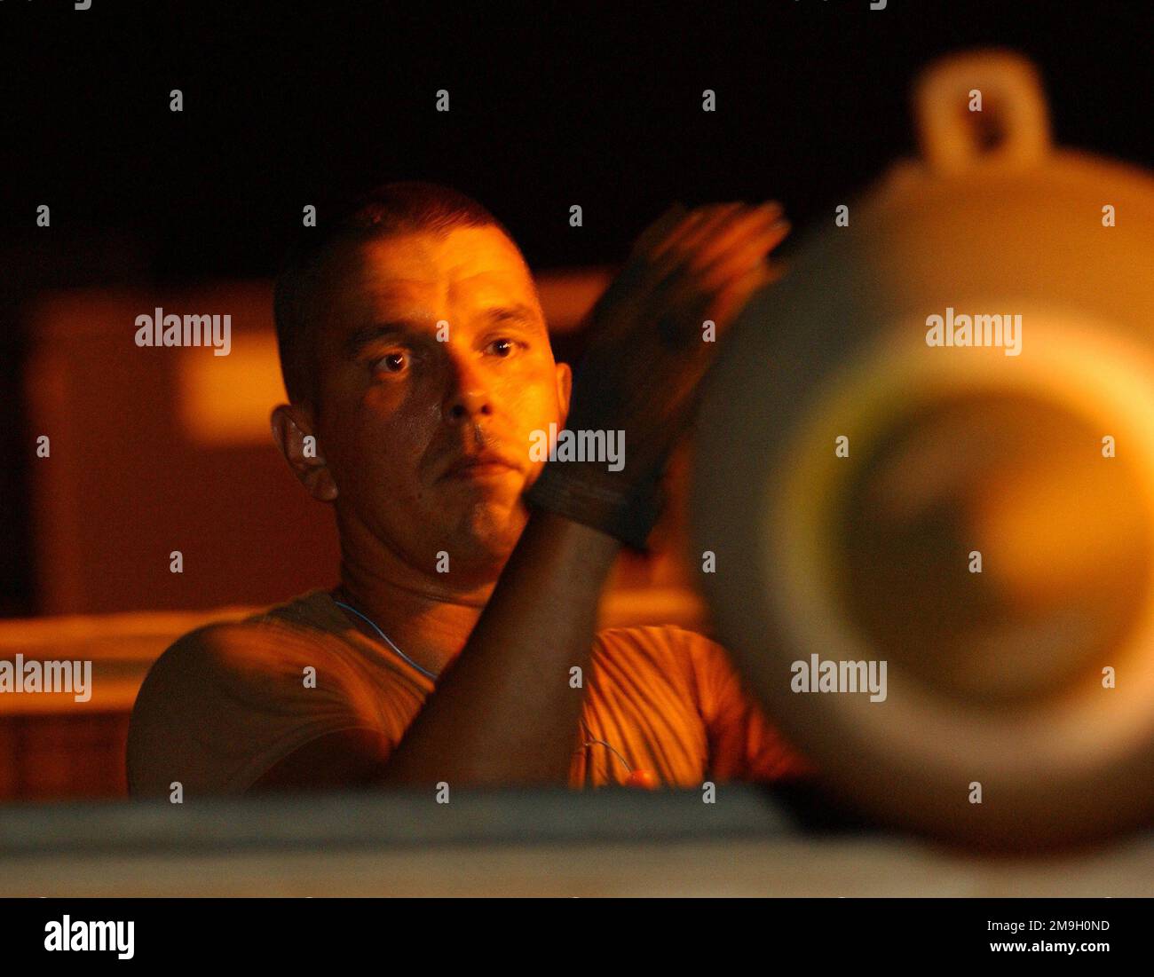 An Air Force weapons loader from the 28th Air Expeditionary Wing ...