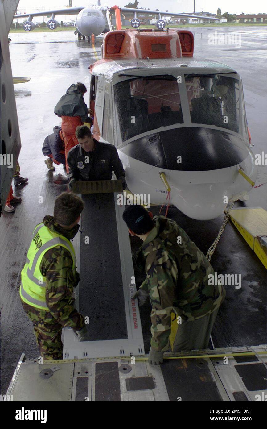 C-141 Loadmaster from the 452nd Air Mobility Wing, March Air Reserve ...