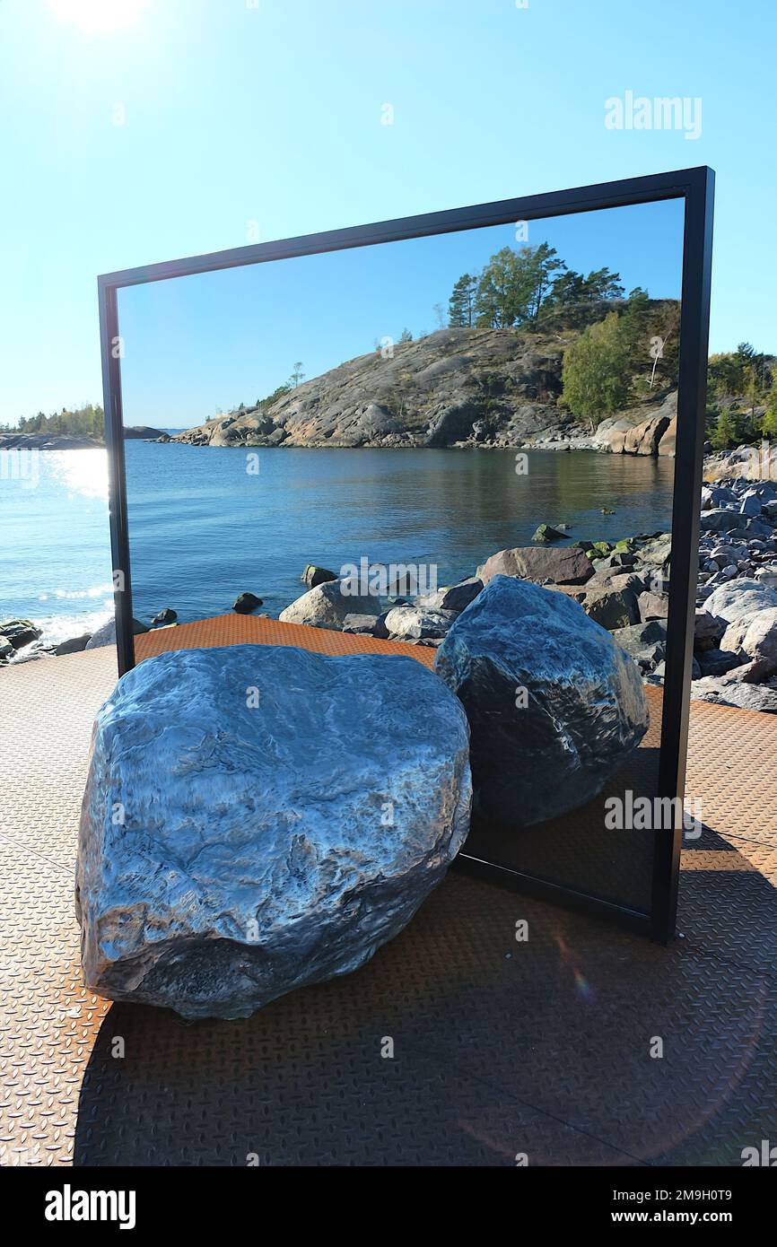 Open air installation Big Be-Hide mirror between two big rocks on the ...
