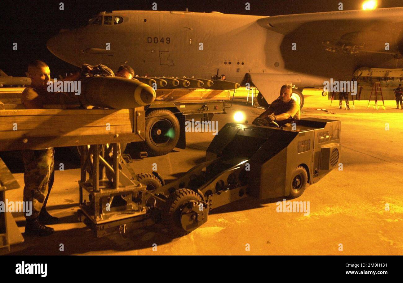 Air Force weapons loaders from the 28th Air Expeditionary Wing, use MJ ...