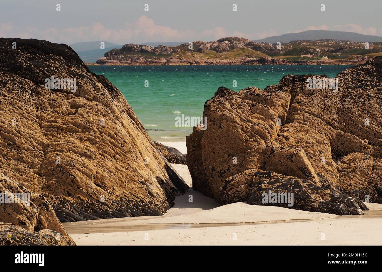 White Strand of the Monk's beach, Iona, Scotland Uk on a sunny summer's ...