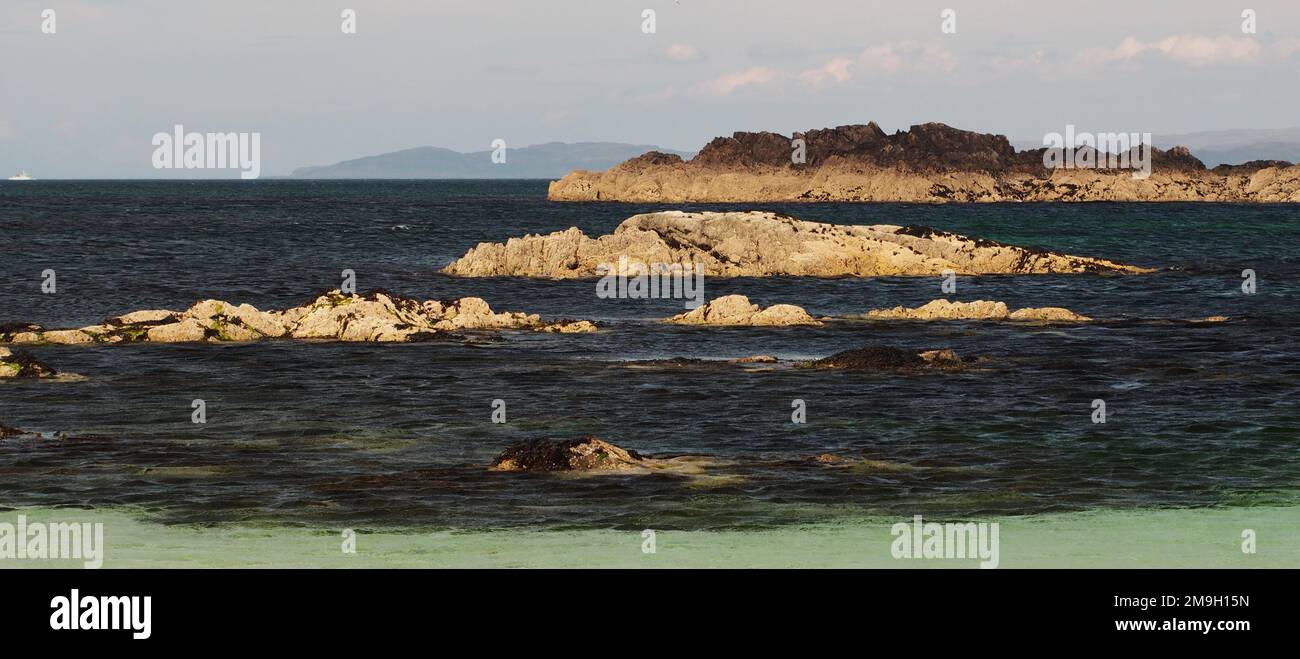 White Strand of the Monk's beach, Iona, Scotland Uk on a sunny summer's ...