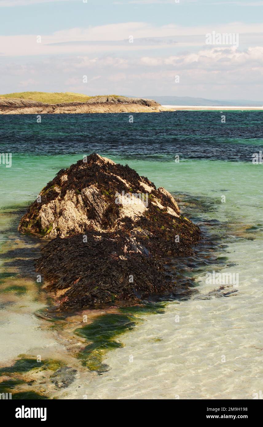 White Strand of the Monk's beach, Iona, Scotland Uk on a sunny summer's ...