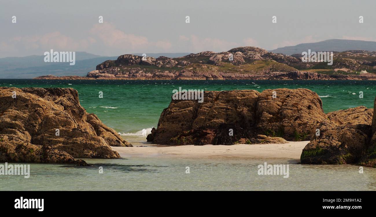 White Strand of the Monk's beach, Iona, Scotland Uk on a sunny summer's ...