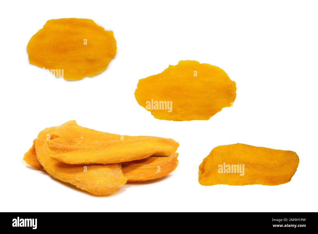 Dry tasty mango slices isolated on a white background. Top view Stock ...