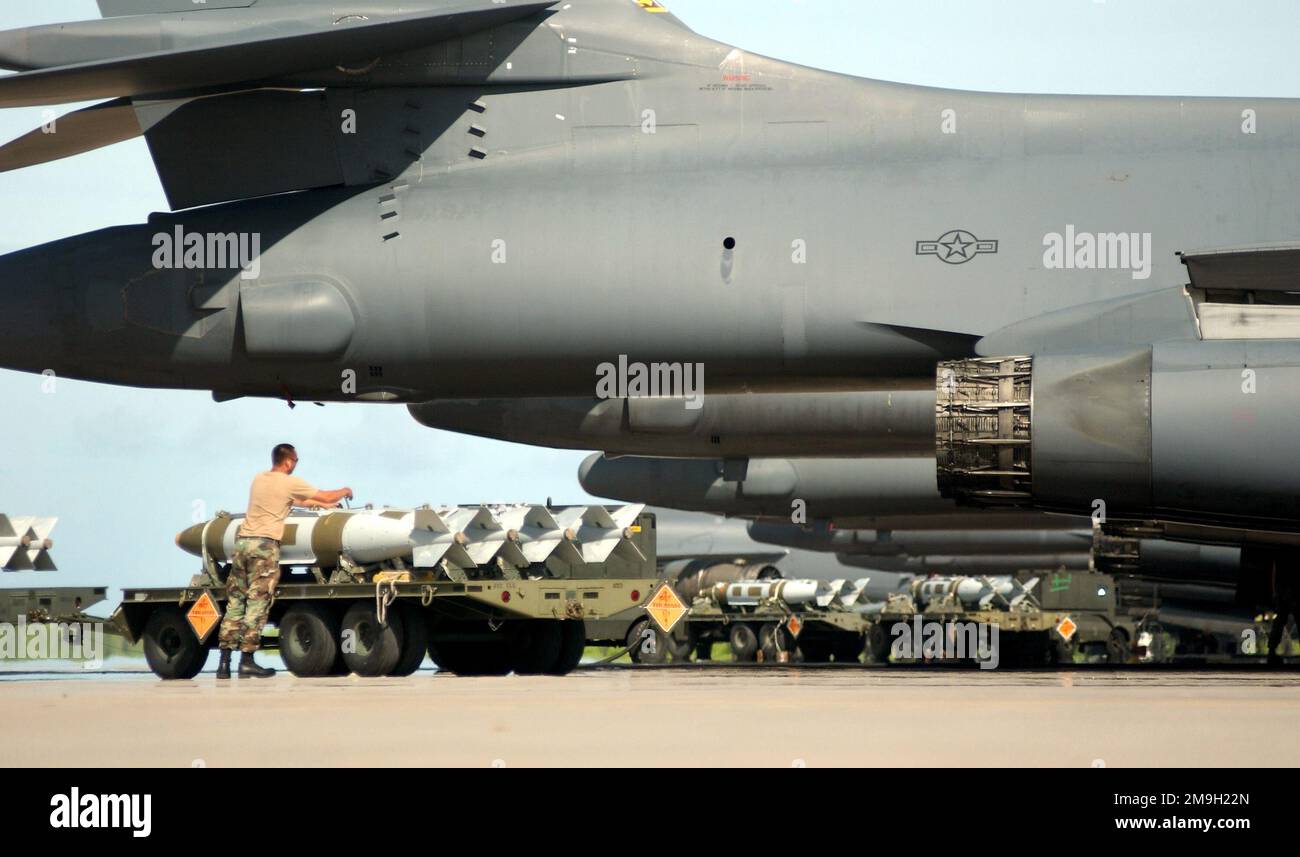 At the weapons trailer an Air Force munitions loader from the 28th Air ...