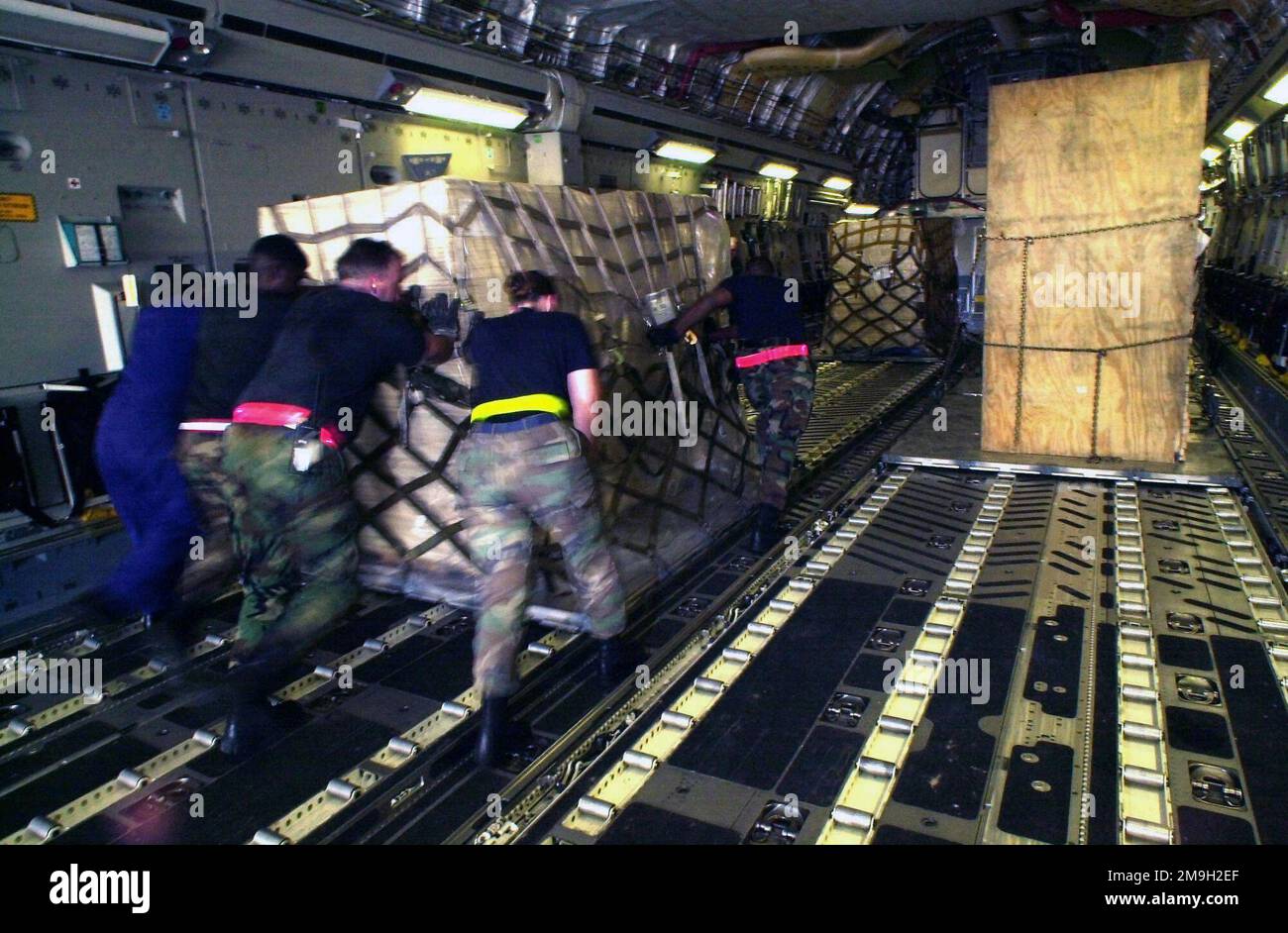 US Air Force (USAF) Airmen assigned to the 728th Air Mobility Squadron ...
