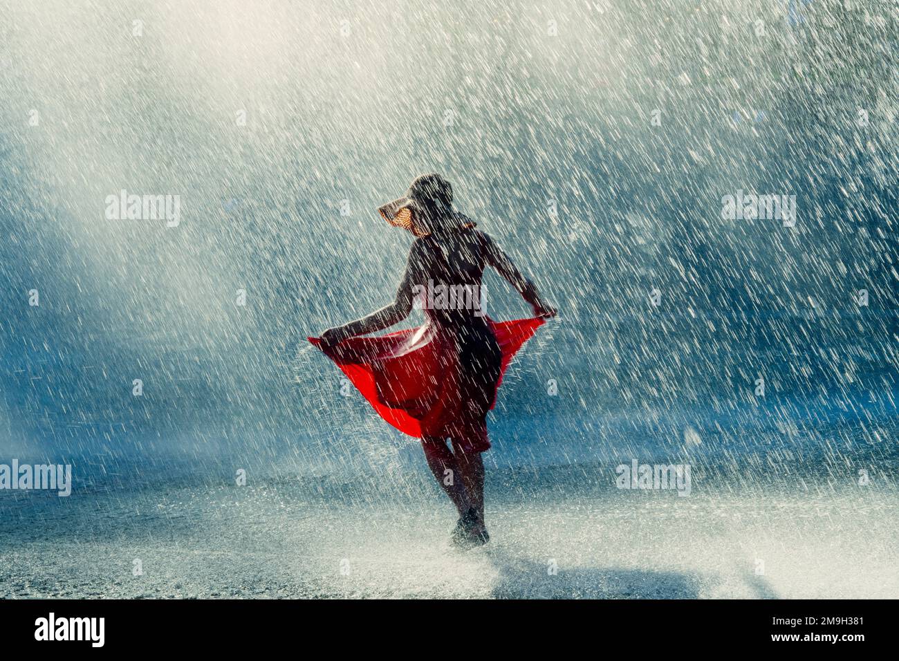 Woman in red dress dancing in fountain, International Fountain, Seattle ...