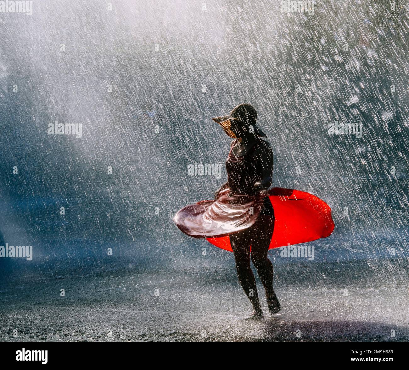 Woman in red dress dancing in fountain, International Fountain, Seattle ...