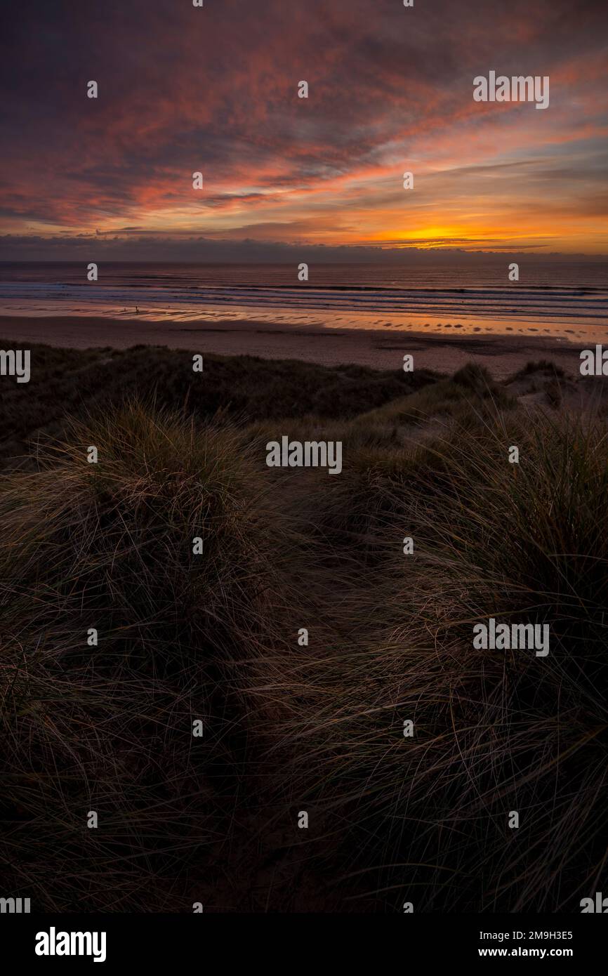 Freshwater West, Pembrokeshire. Winter sunset on large sandy beach in ...