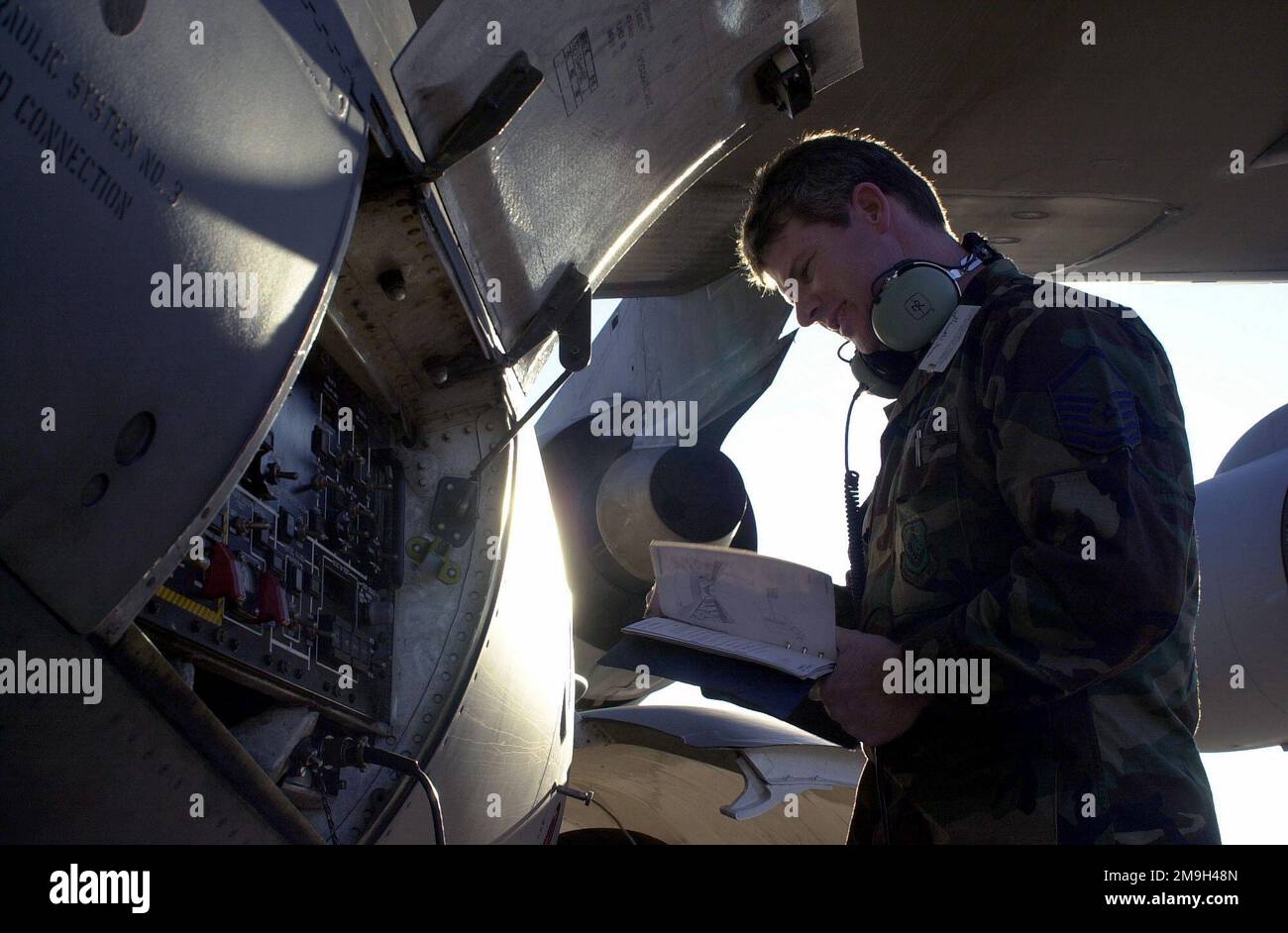 US Air Force (USAF) MASTER Sergeant (MSGT) Dave Faires monitors fuel ...