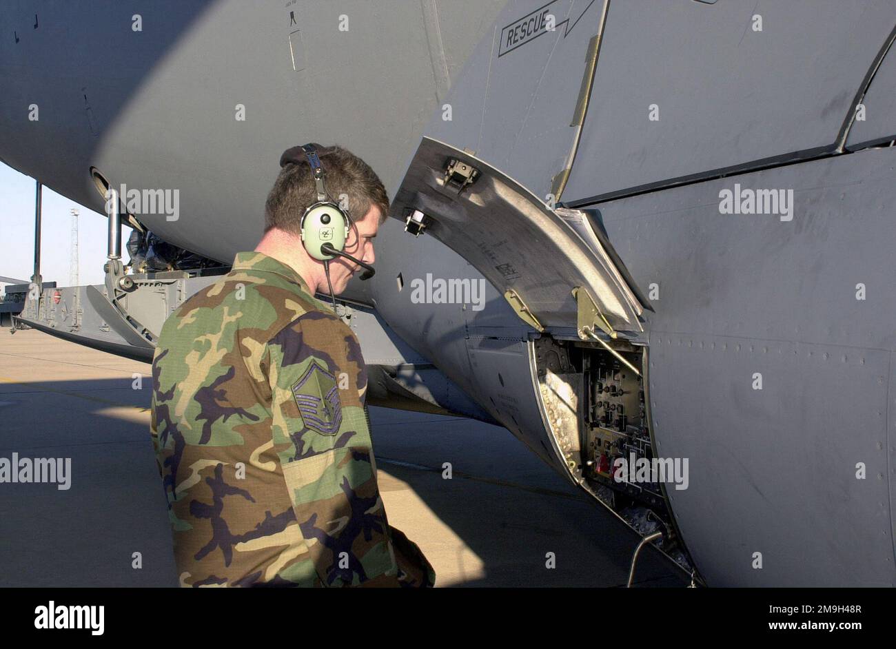 MASTER Sergeant (MSGT) Dave Faires monitors fuel added to a C-17 ...