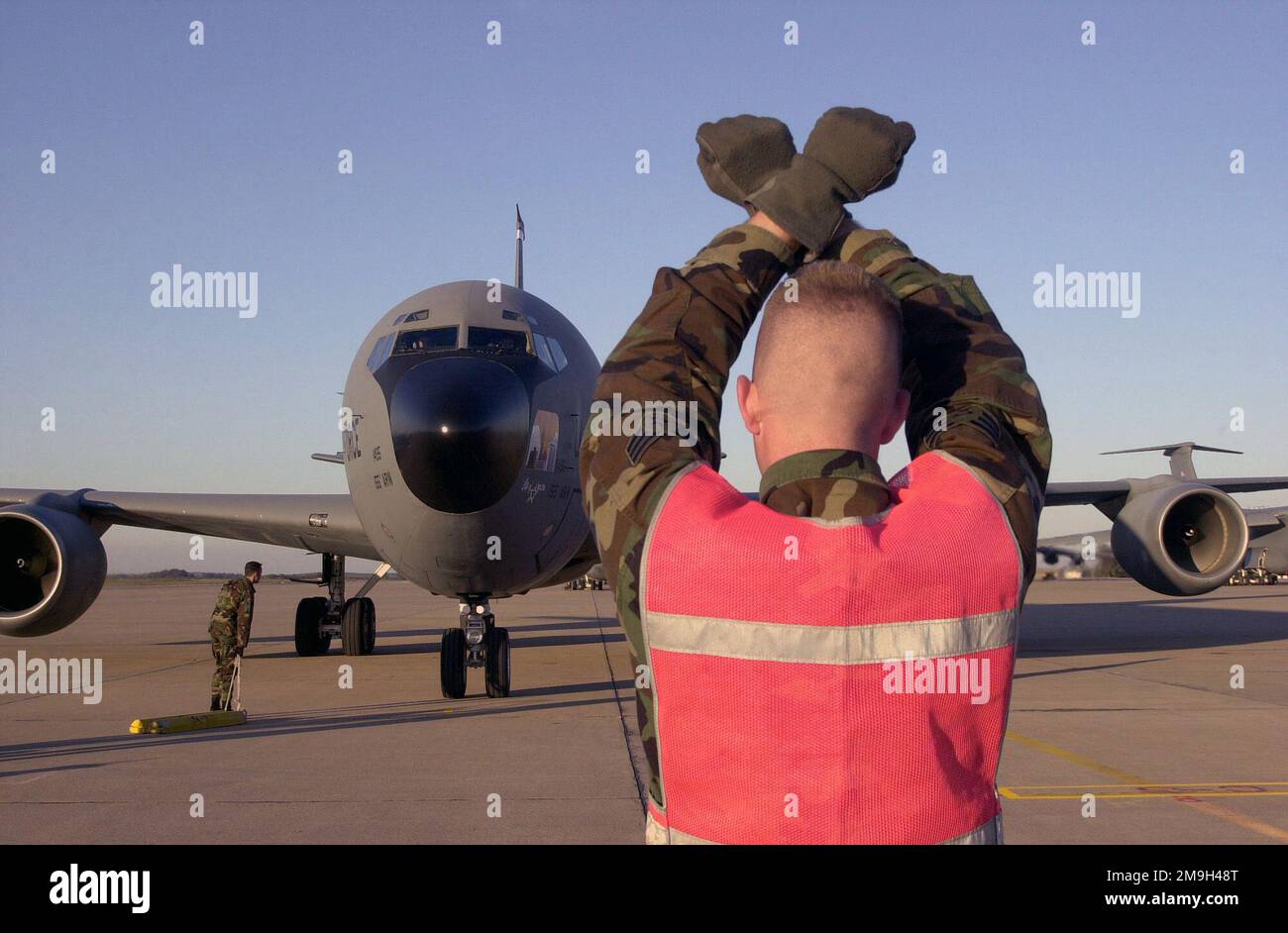 SENIOR AIRMAN (SRA) Dan Westman marshals a KC-135 Stratotanker ...