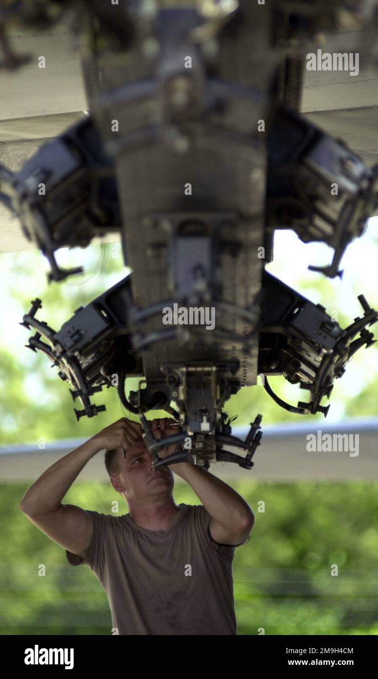 An Air Force munitions specialist from the 28th Air Expeditionary Wing ...