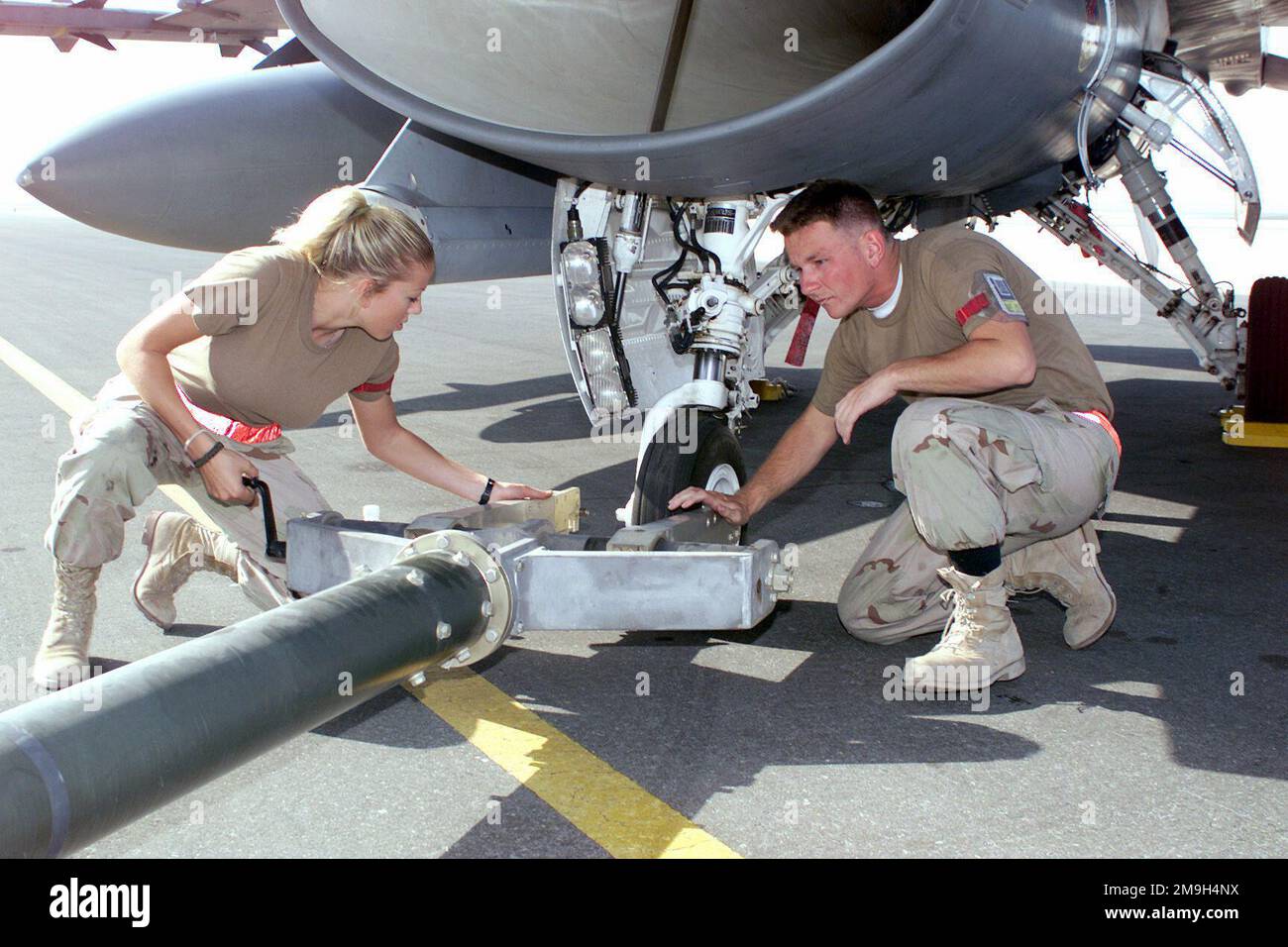 AIRMAN First Class (A1C) Danicka Jensen, a Crew CHIEF (left) and STAFF ...
