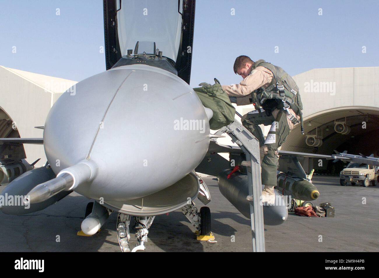 Fighter Pilot First Lieutenant (1LT) Dave "A-Bee" DeAngelis climbs the ...