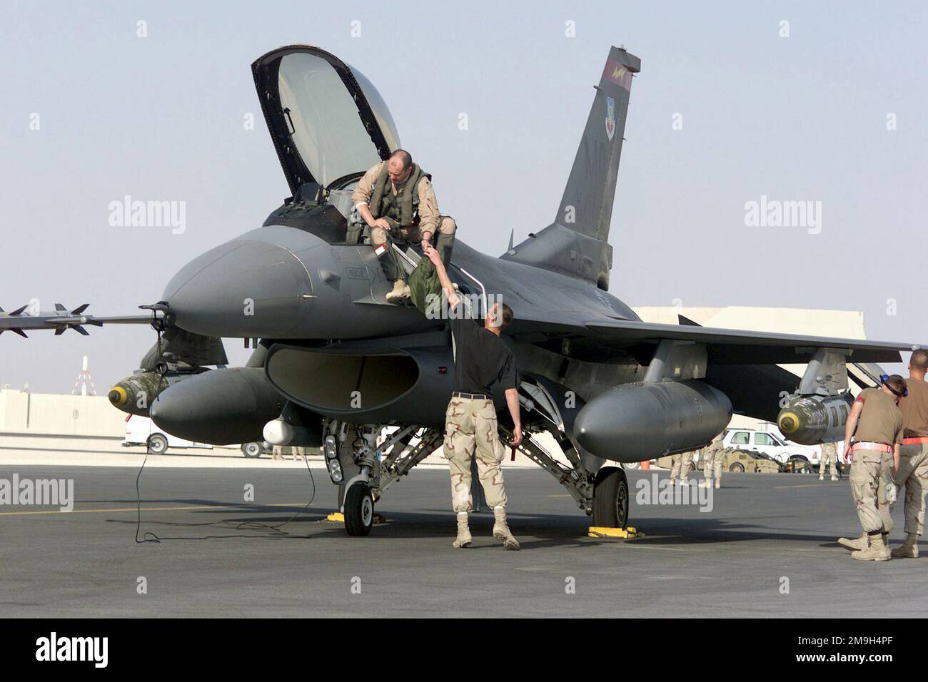 An F-16 Fighting Falcon pilot from the 389th Fighter Squadron (FS) gets ...