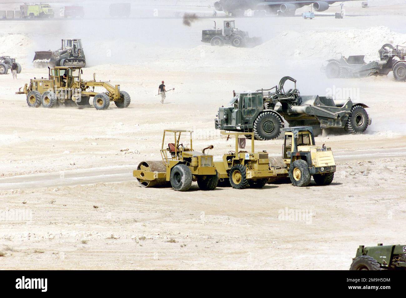 Members of the 823rd Red Horse Squadron (RHS) use M923 5-Ton, M917 20 ...