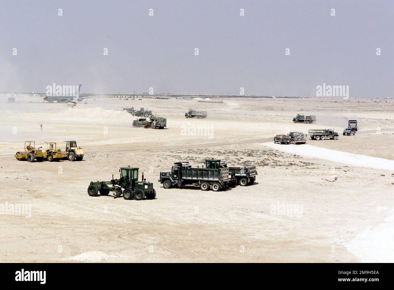 Members of the 823rd Red Horse Squadron (RHS) use M923 5-Ton, M917 20 ...