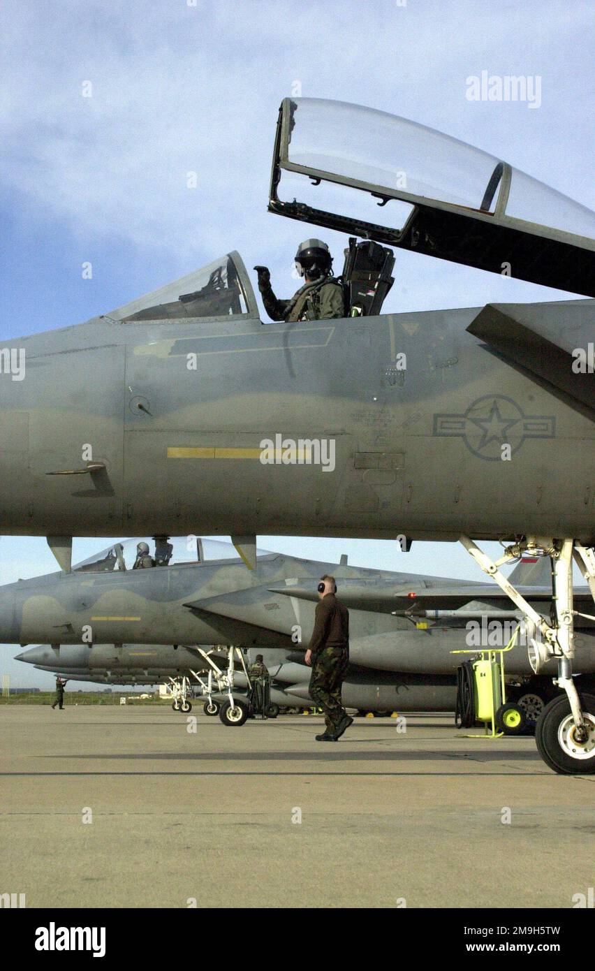 United States Air Force F-15C Eagle fighter aircraft wait in formation ...