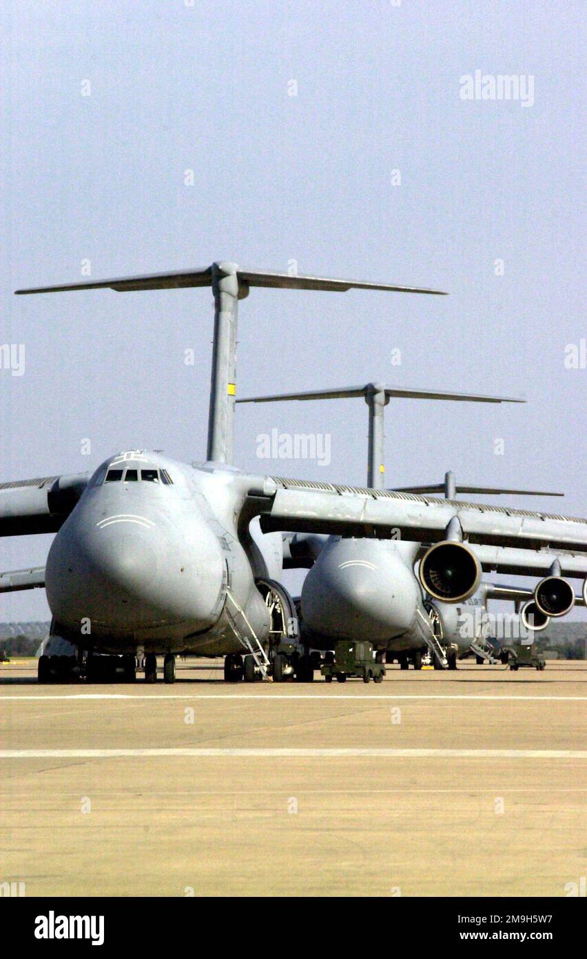 A line of C 5 Galaxy cargo aircraft on the flightline at Moron Air Base ...