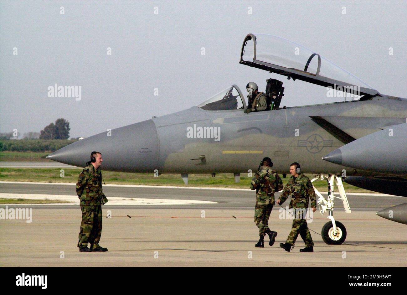 Ground crew members prepare a United States Air Force F-15C Eagle ...
