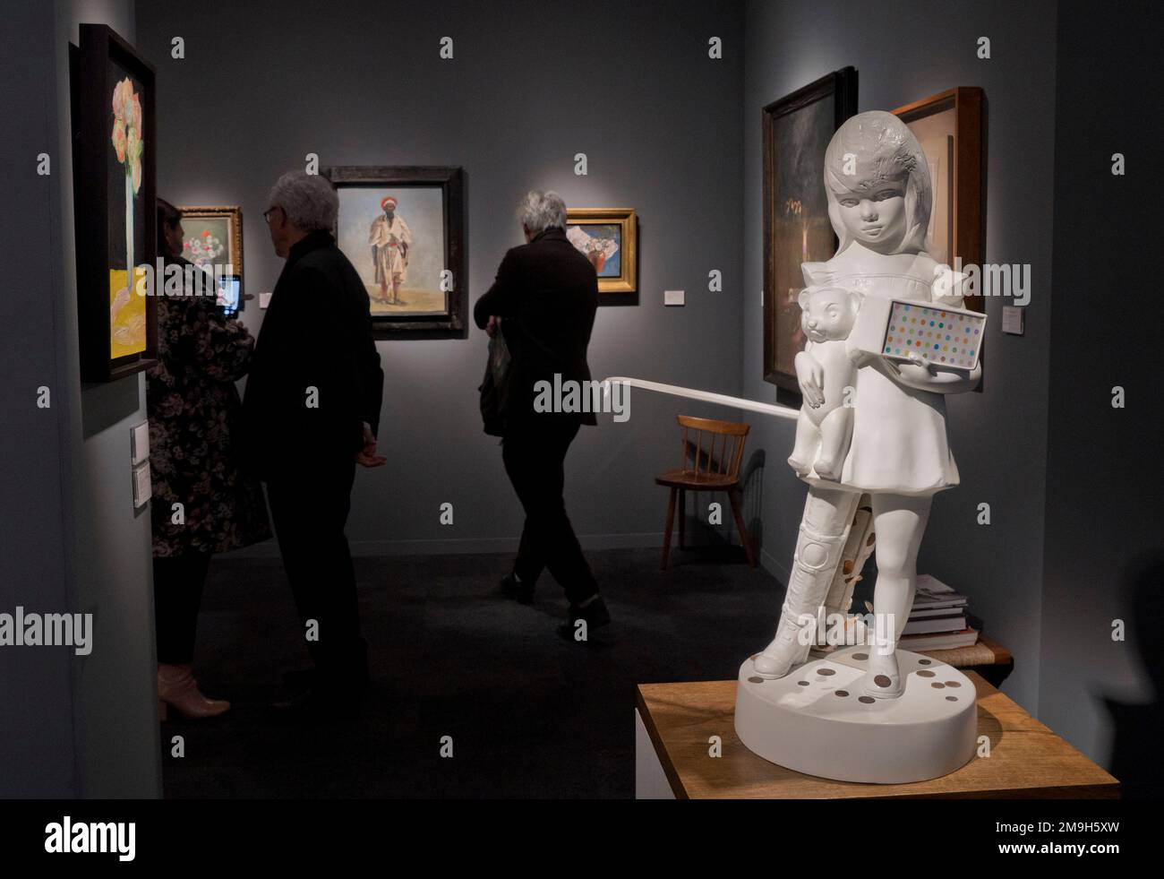 NFT statue at gallery booth Stock Photo - Alamy