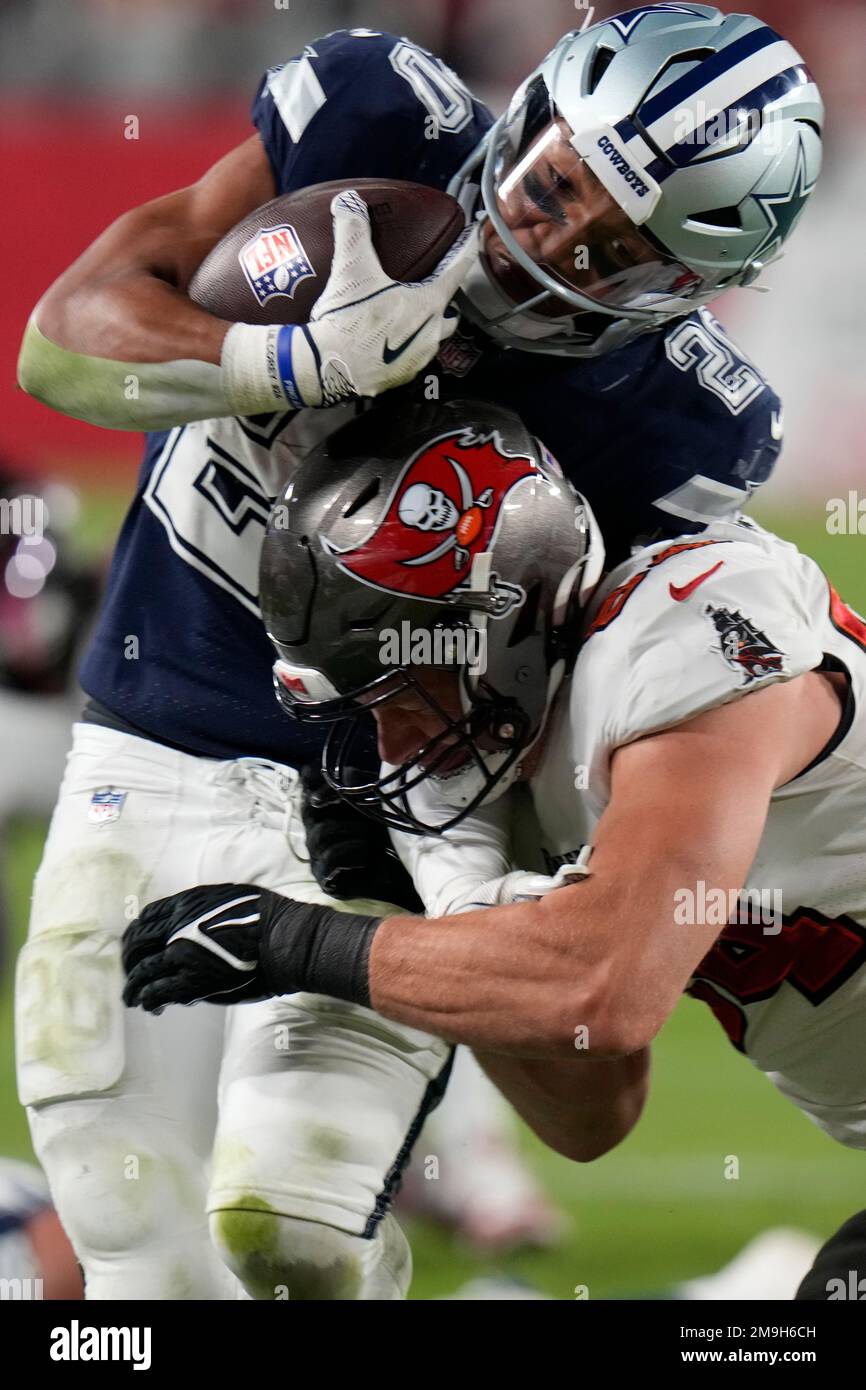 Dallas Cowboys running back Tony Pollard (20) is hit by Tampa Bay ...