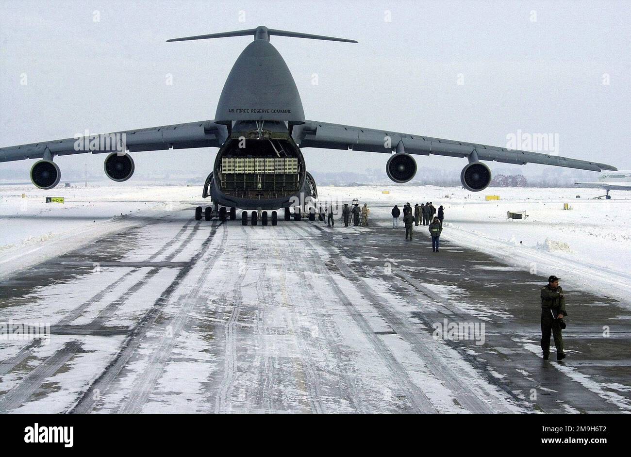 A United States Air Force (USAF) C-5 Galaxy cargo aircraft arrives at ...