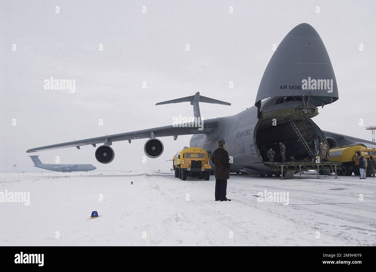 A United States Air Force (USAF) C-5 Galaxy cargo aircraft arrives at ...