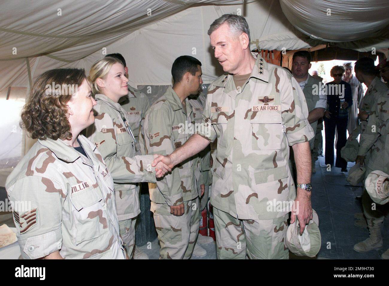 AIRMAN (AMN) Jamie Young shakes the hand of the Chairman of the Joint ...